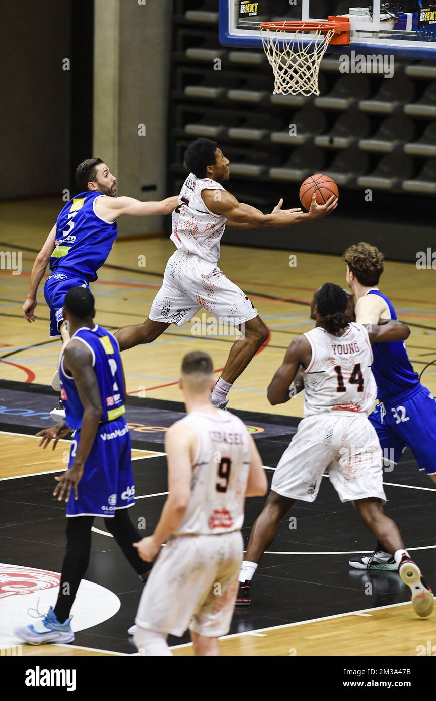 Mechelen's Domien Loubry and Leuven's KeVaughn Allen pictured in action ...