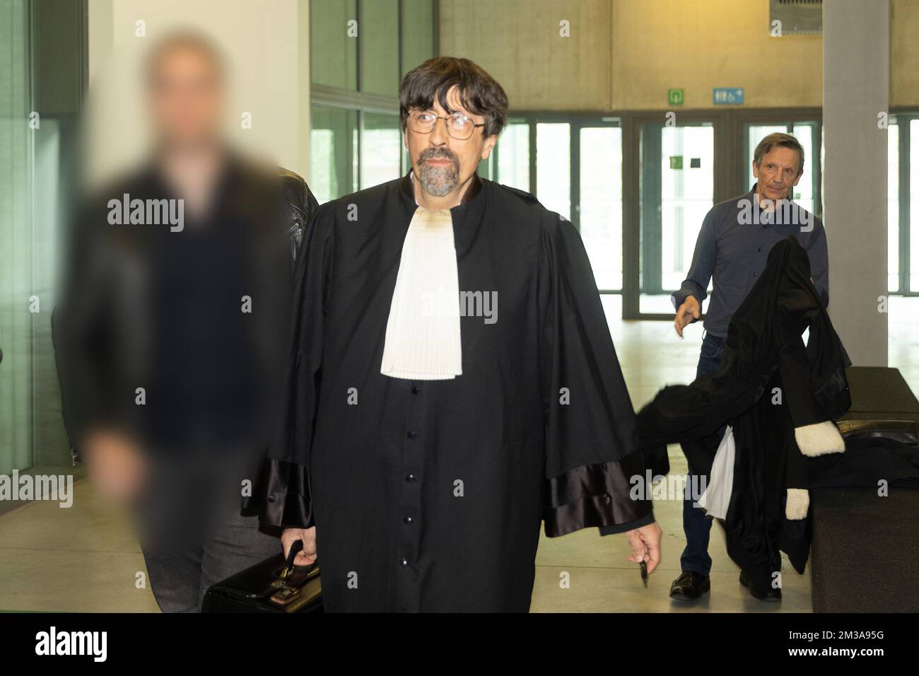 Lawyer Luc Deceuninck pictured with his client during a session ...