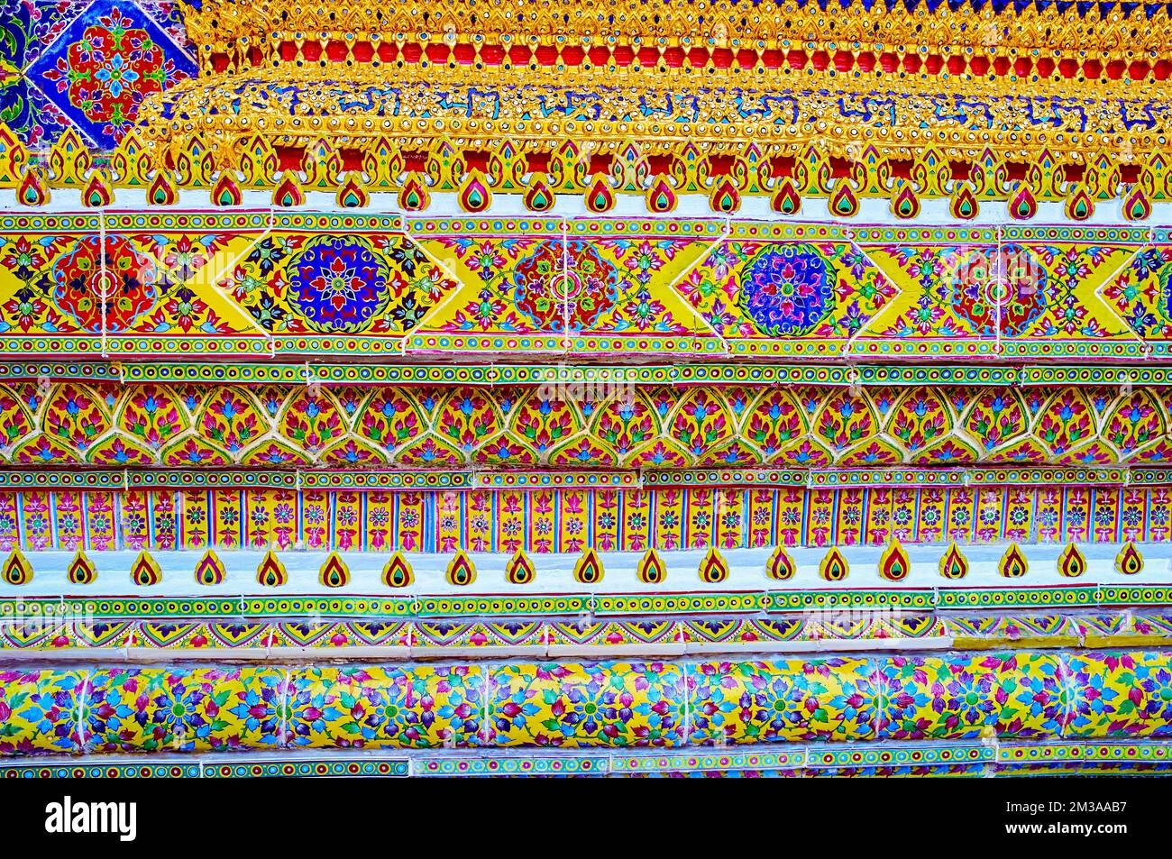 Historicaa colorful ceramic tile decorations on the wall of Wat ...
