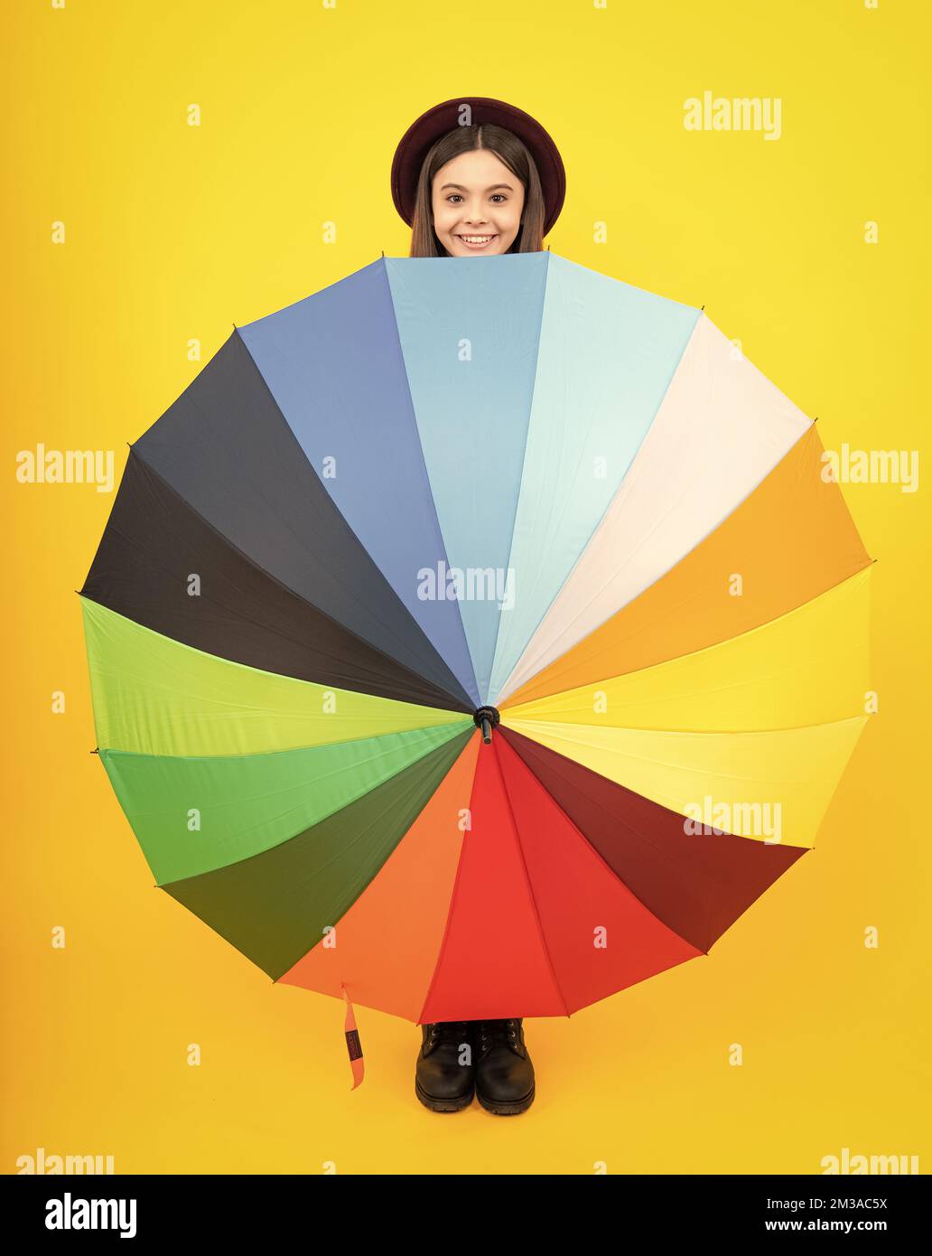 Happy teenager portrait. Child teenager girl with umbrella isolated on ...