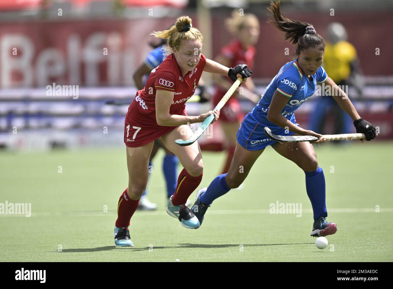 Belgium's Michelle Struijk and India's Rani Rampal fight for the ball ...
