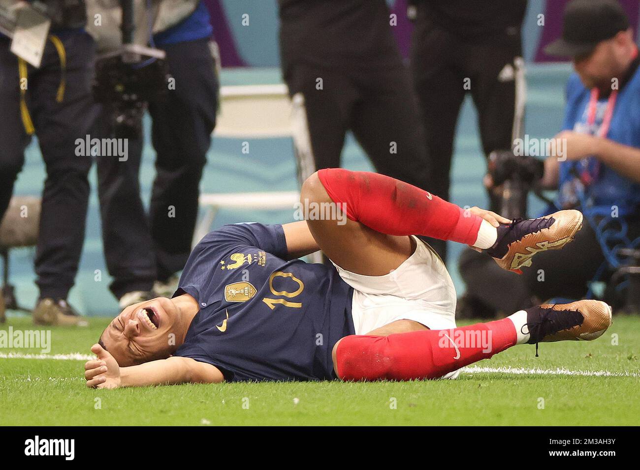 Kylian Mbappe of France on the ground during the FIFA World Cup 2022 ...