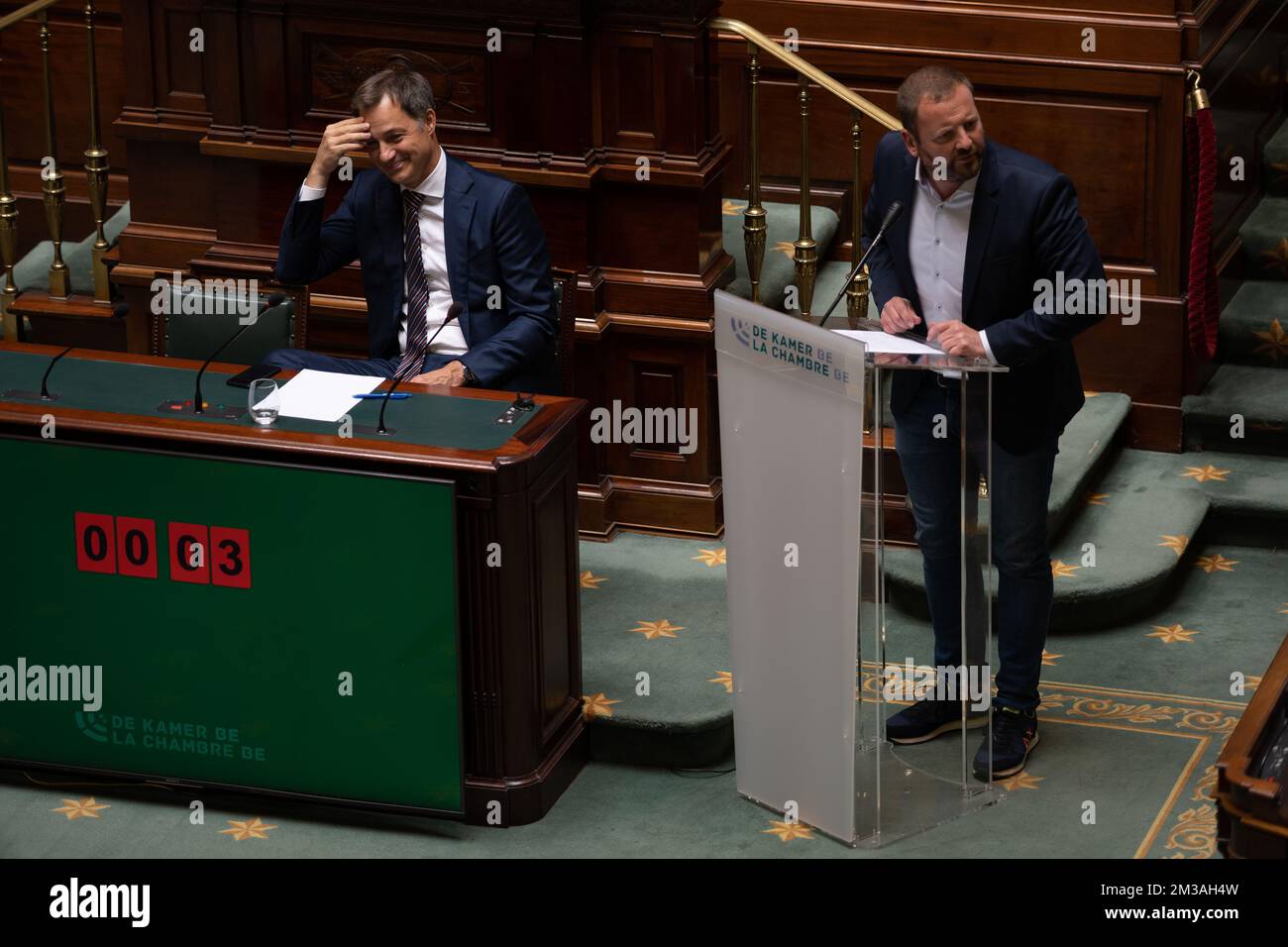 PS' Patrick Prevot (R) and Prime Minister Alexander De Croo are pictured during a plenary ...