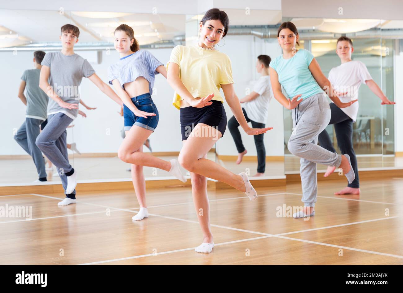 Teenage dancers practicing new dance in studio Stock Photo - Alamy