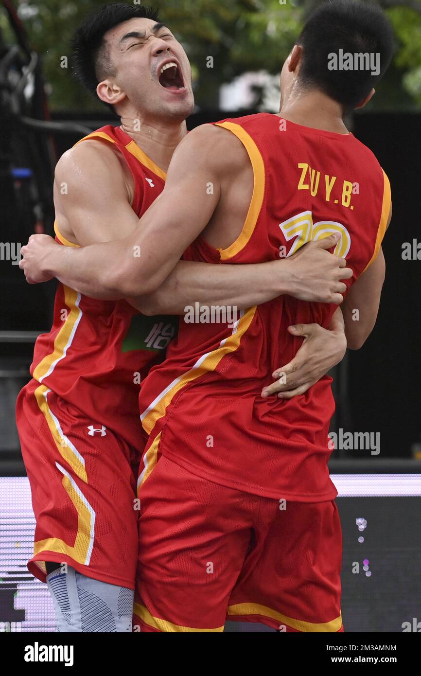 China's Hanyu Guo and China's Yuanbo Zhu celebrate after winning a 3x3 ...