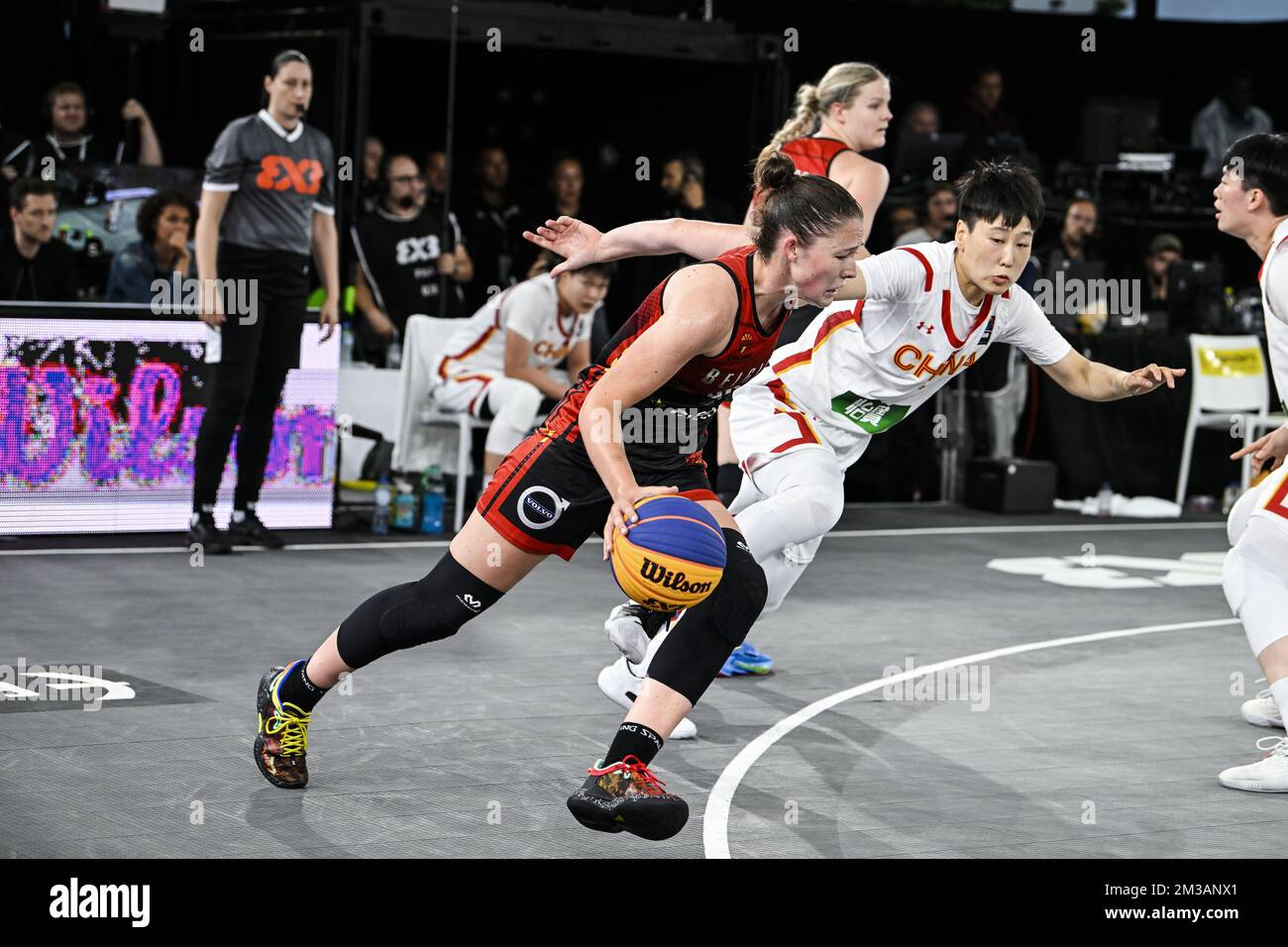 Belgium's Ine Joris and China's Junwei Cao pictured in action during a 3x3 basketball game ...
