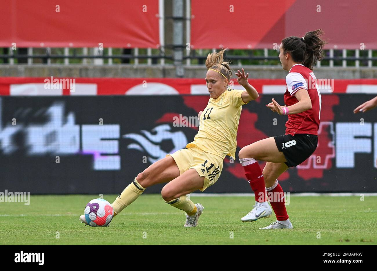 Belgium's Janice Cayman and Austria's Barbara Dunst pictured in action ...
