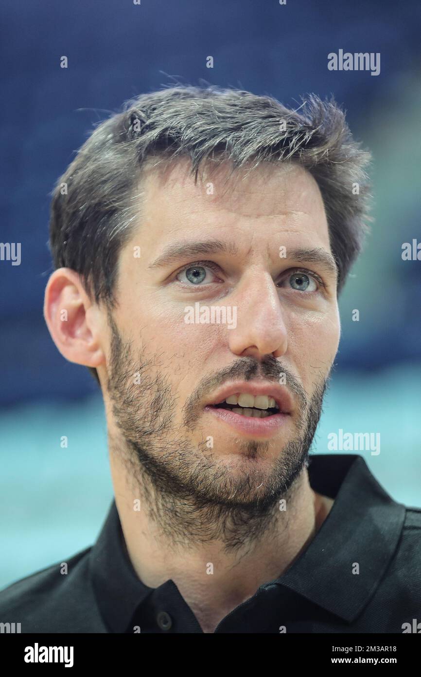 Belgium's Sam Van Rossom talks to his players during a media day of ...