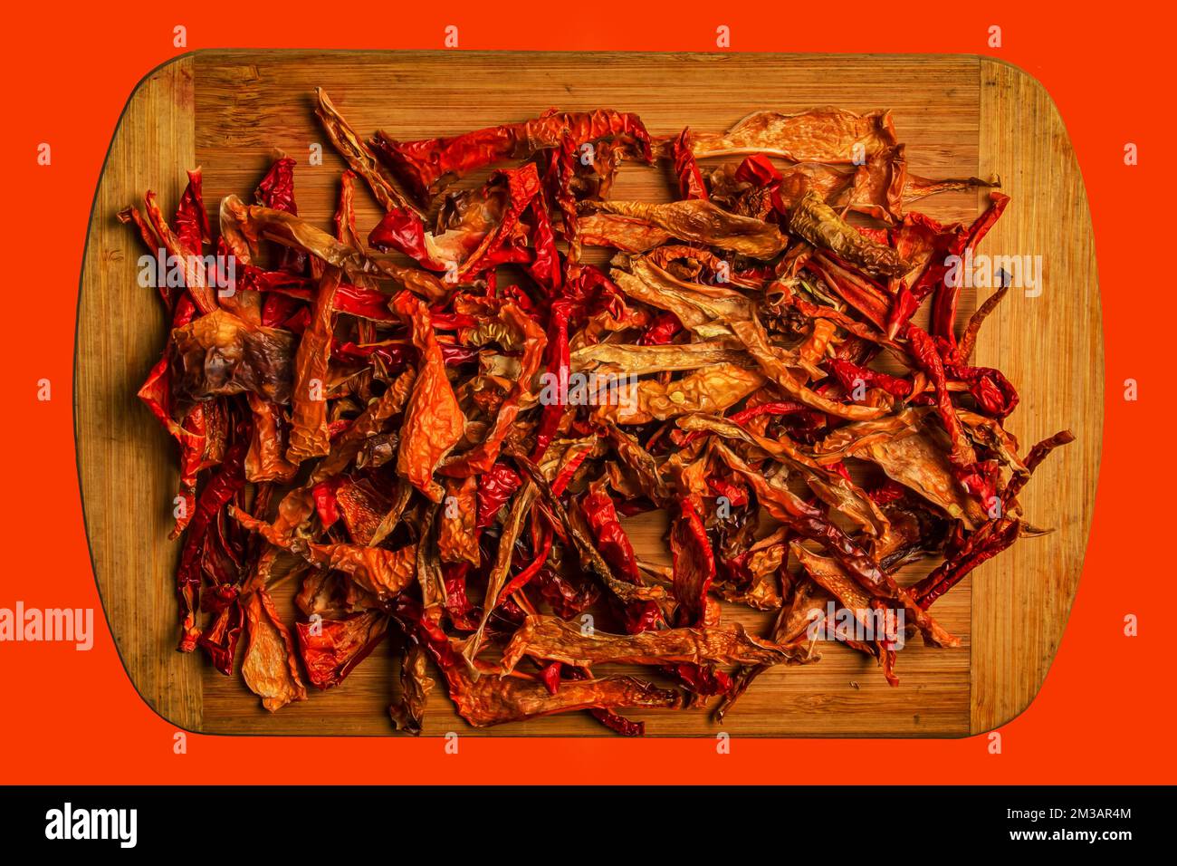 Background of dried organic red capsicum kappia sweet bell pepper chips ...
