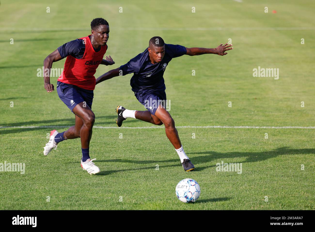 Two unidentified players pictured in action during a training session ...