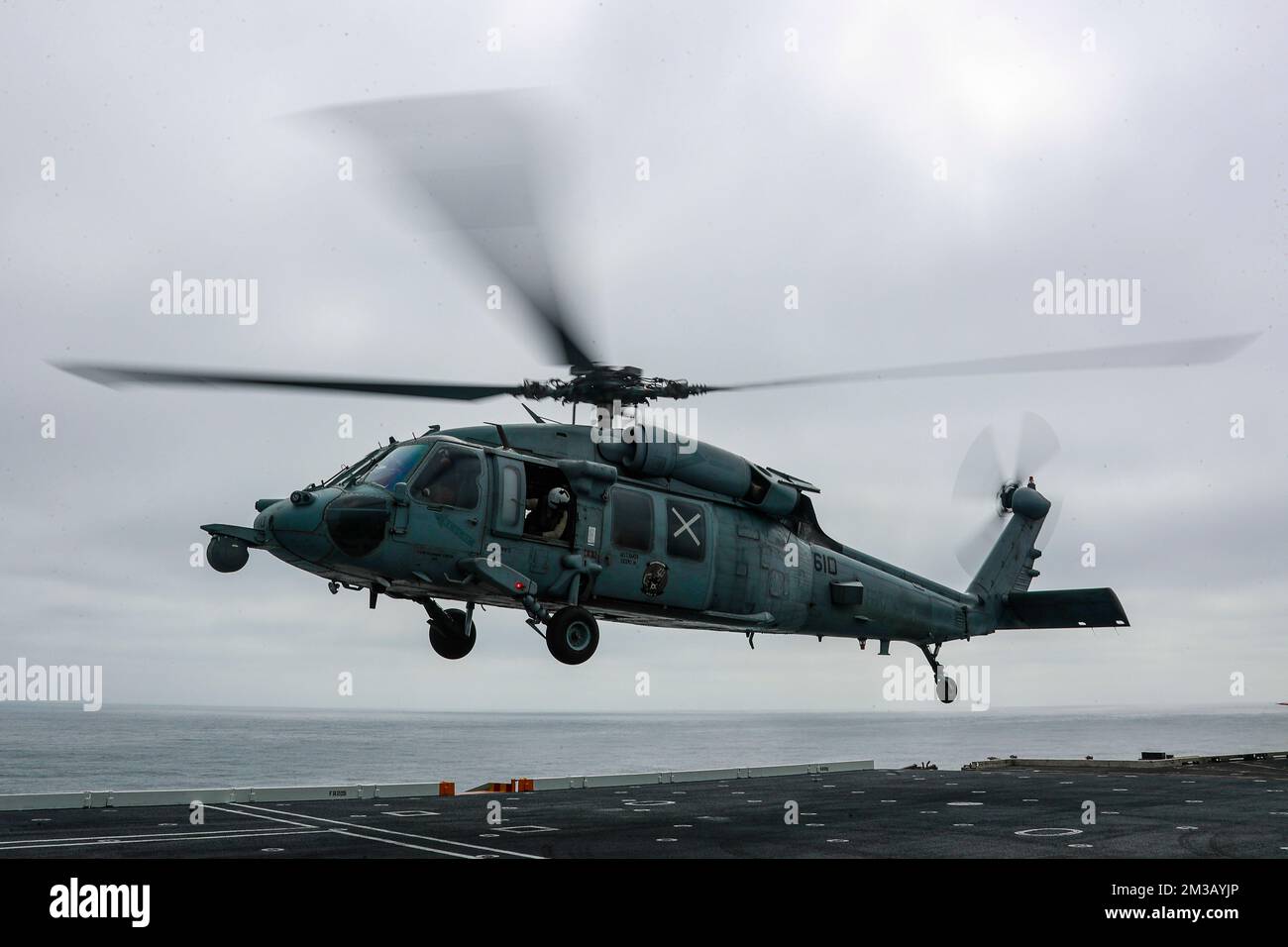 220928-N-CH260-1250 PACIFIC OCEAN (Sept. 28, 2022) An MH-60S Sea Hawk ...