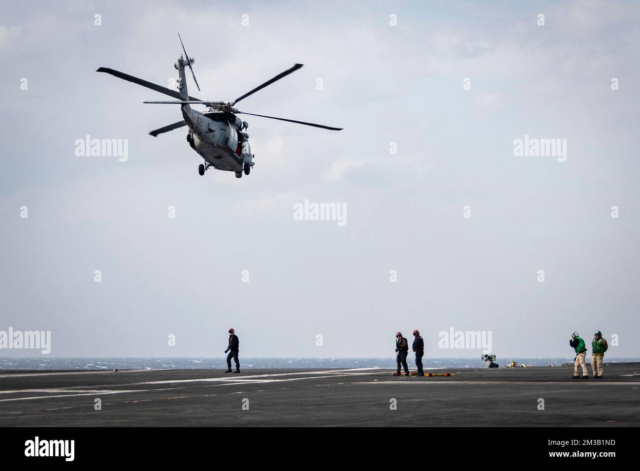 221214-N-WU964-1005 PHILIPPINE SEA (Dec. 14, 2022) An MH-60S Sea Hawk ...