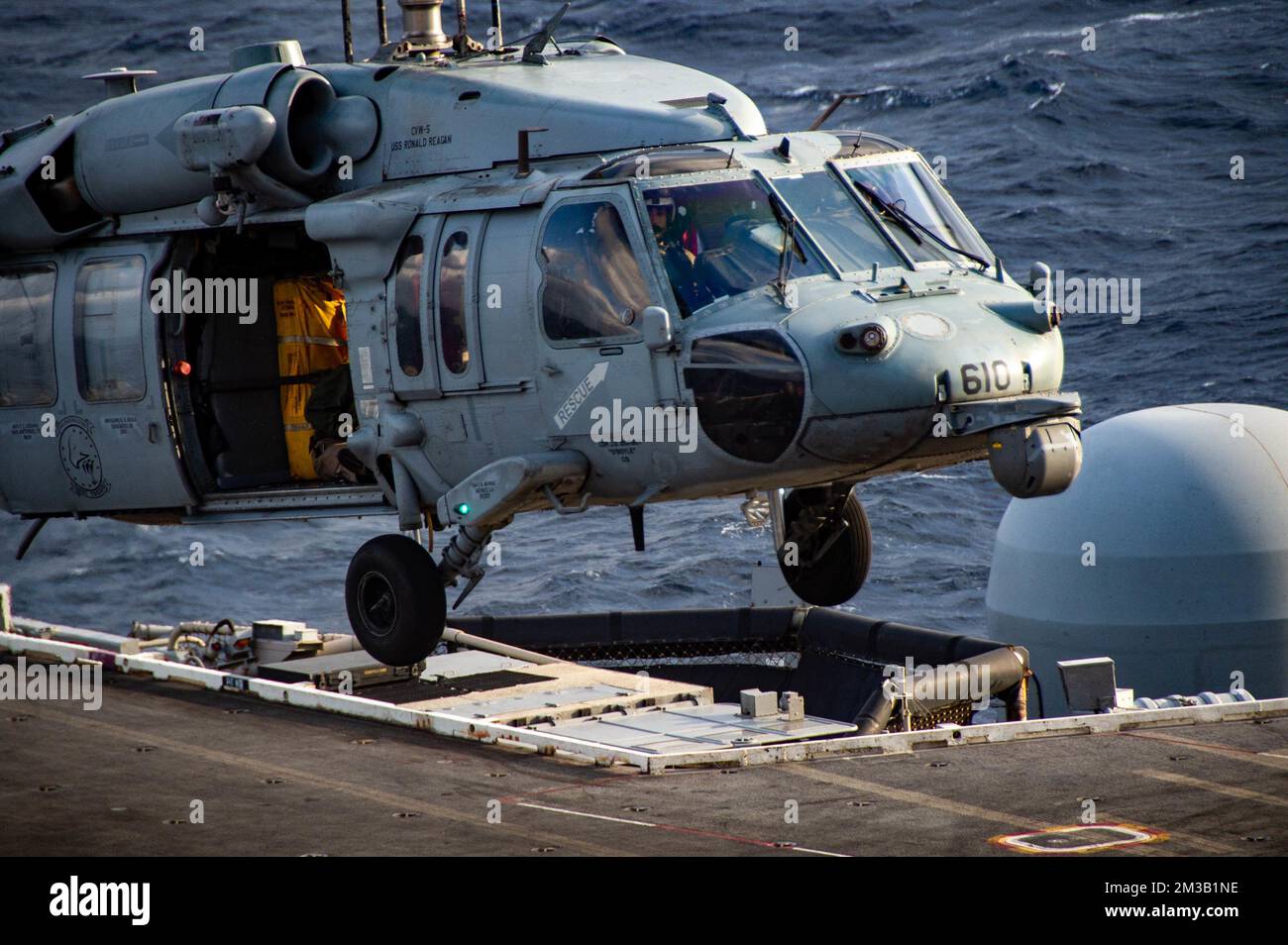 221214-N-RQ159-1056 PHILIPPINE SEA (Dec. 14, 2022) An MH-60S Sea Hawk ...