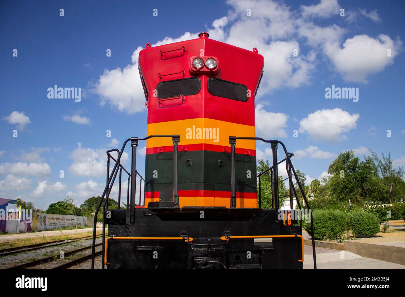 Old exhibition train, museum railway station, blue sky with clouds ...