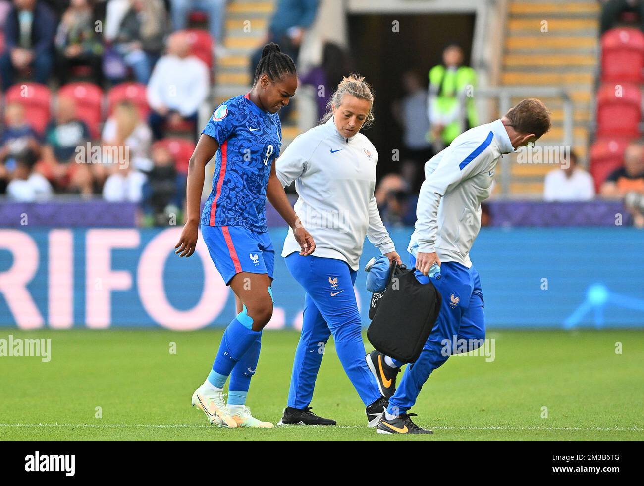 France's Marie-Antoinette Katoto leaving the pitch injured during a ...