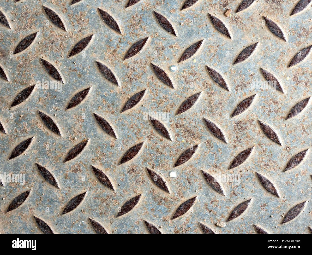 Metal non slip floor with raised pattern Stock Photo - Alamy