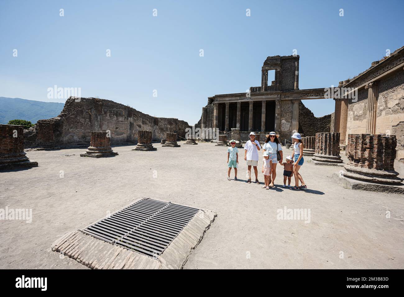 Family tourist visit Pompeii ancient city, Italy Stock Photo - Alamy
