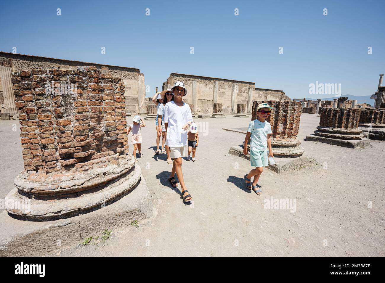 Family tourist walking at Pompeii ancient city, Italy Stock Photo - Alamy