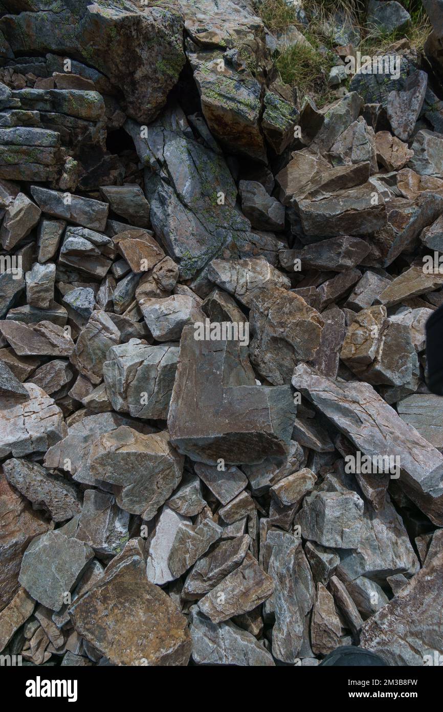 Stone formed in the shape of the letter L with many other mountain ...