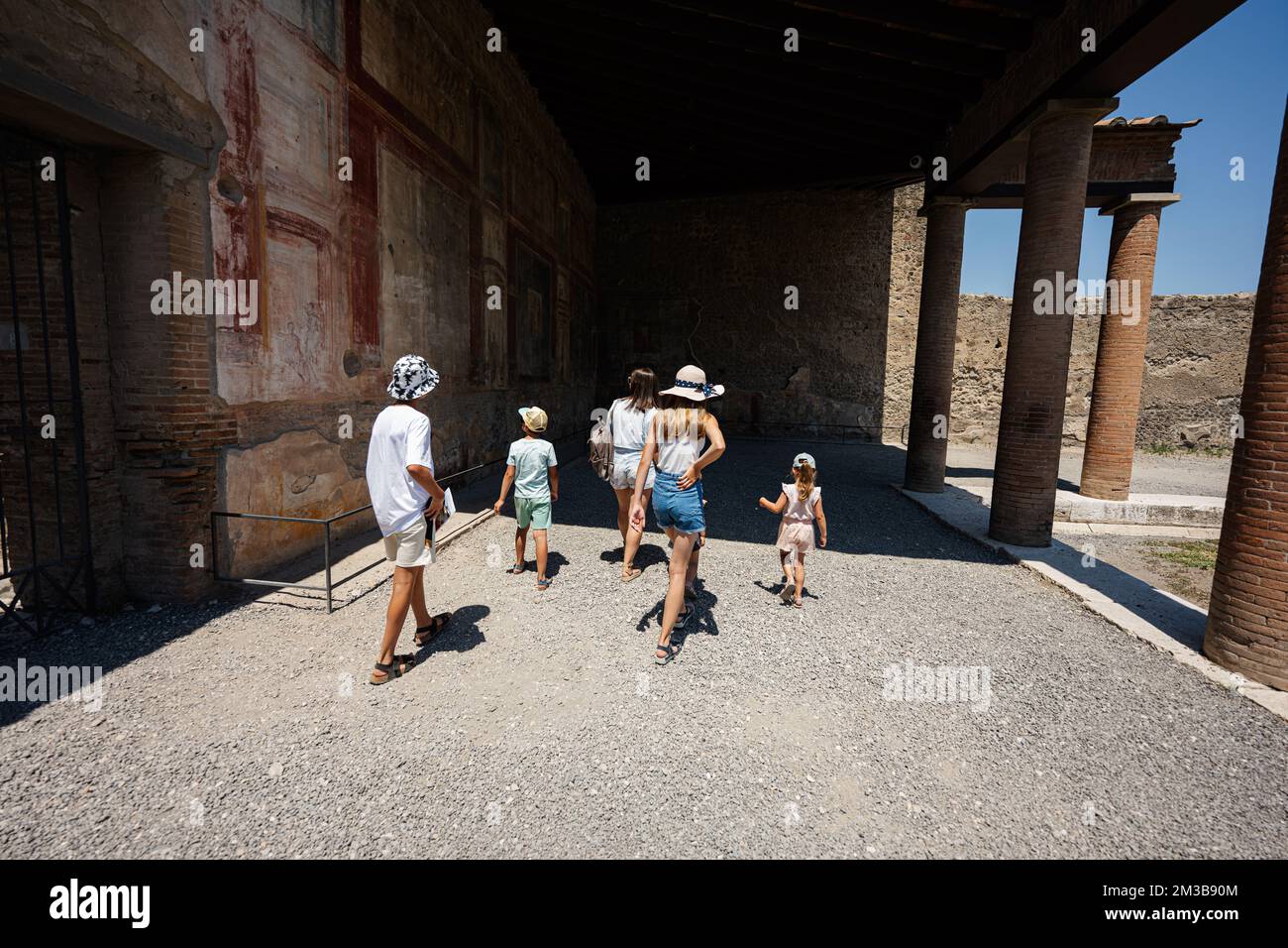 Family tourist walking at Pompeii ancient city, Italy Stock Photo - Alamy