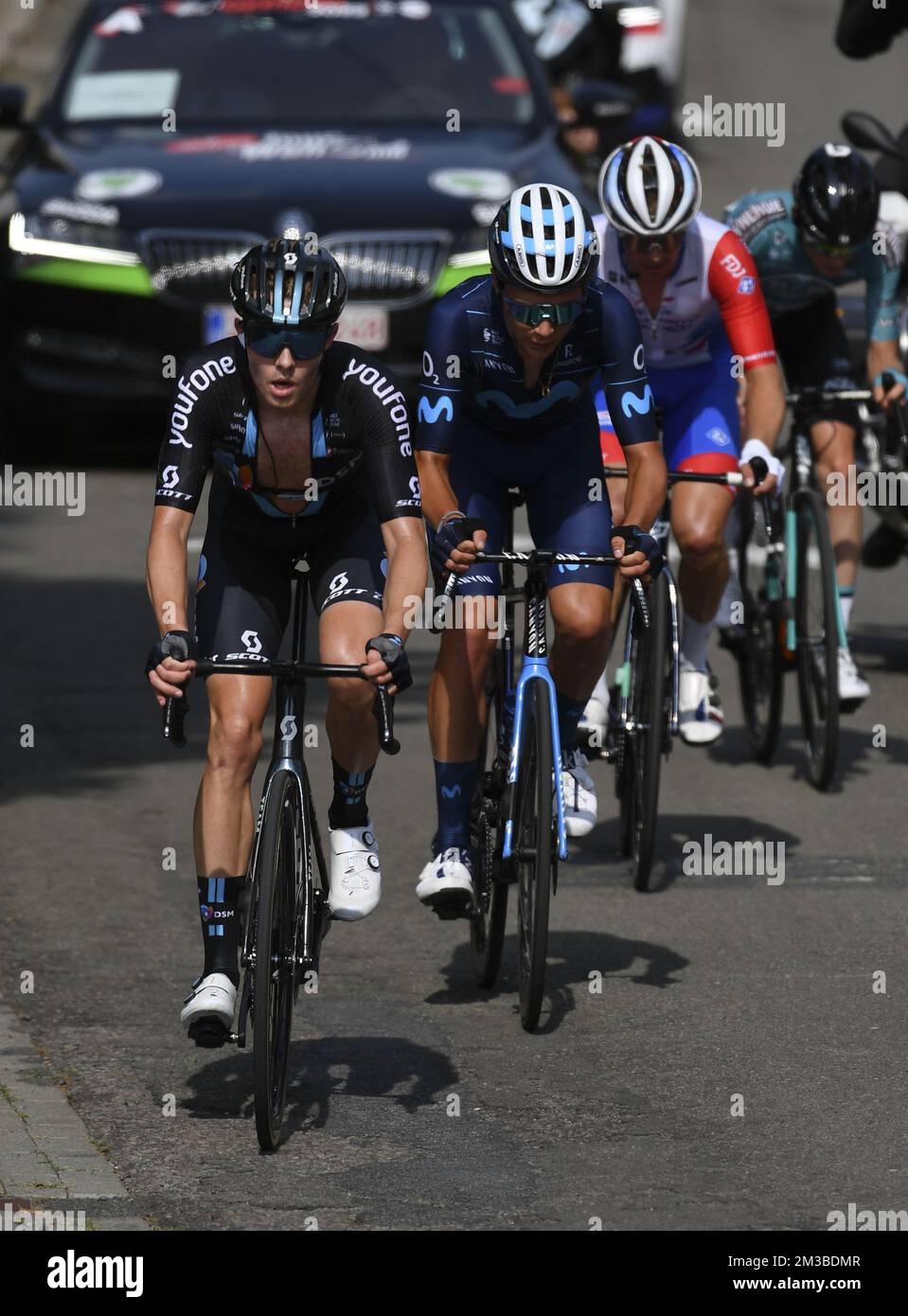 Danish Casper Pedersen of Team DSM, Swiss Johan Jacobs of Movistar Team and Swiss Fabian ...