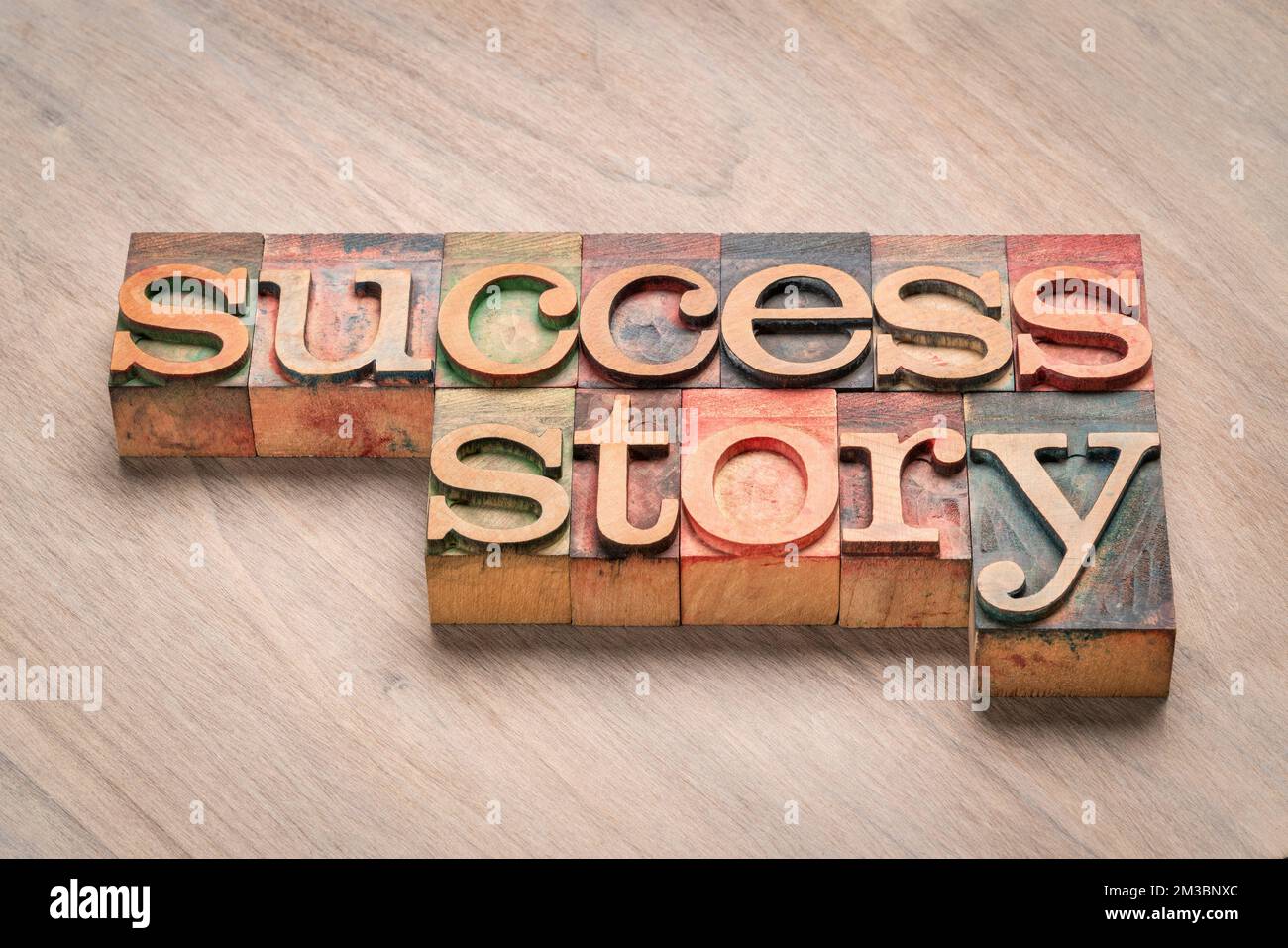 success story - word abstract in letterpress wood type blocks stained ...