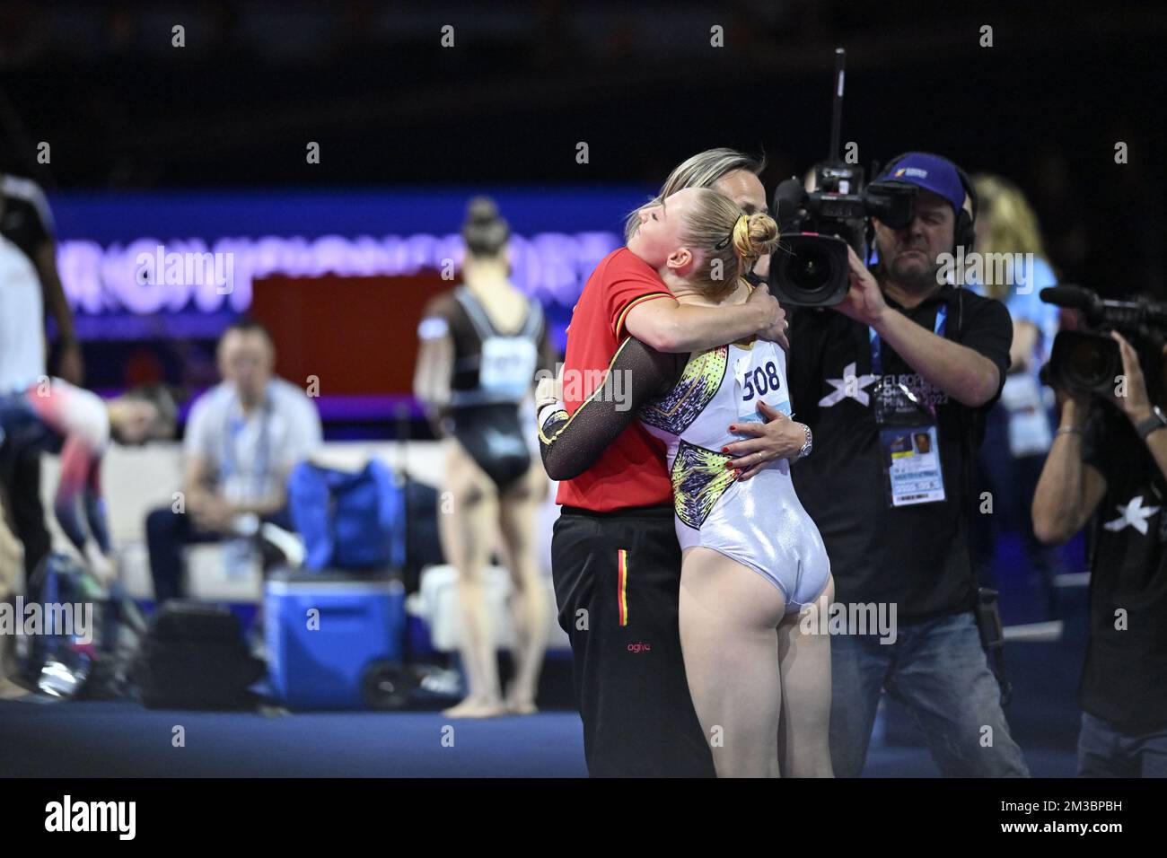 Belgian gymnastic coach Marjorie Heuls and Belgian gymnast Lisa Vaelen ...