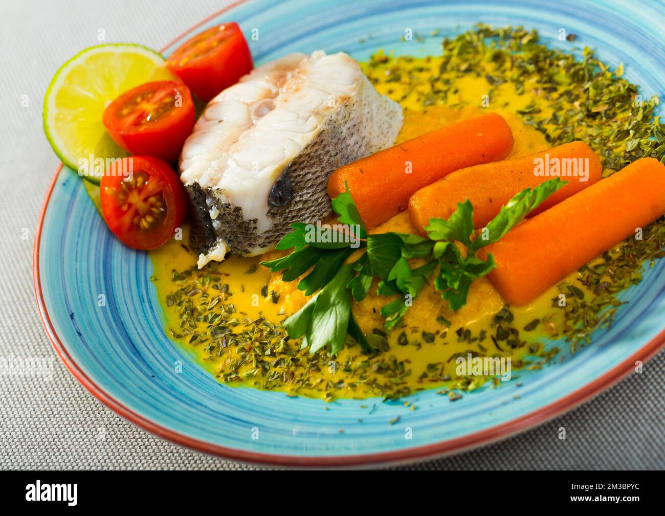 Recipe of steamed merluccius with vegetable pate Stock Photo - Alamy