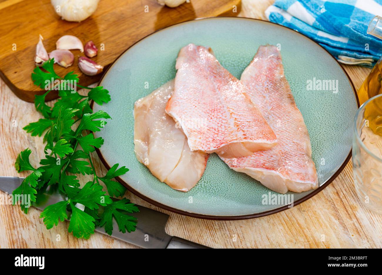 Fresh raw fillet of sea bass Stock Photo - Alamy