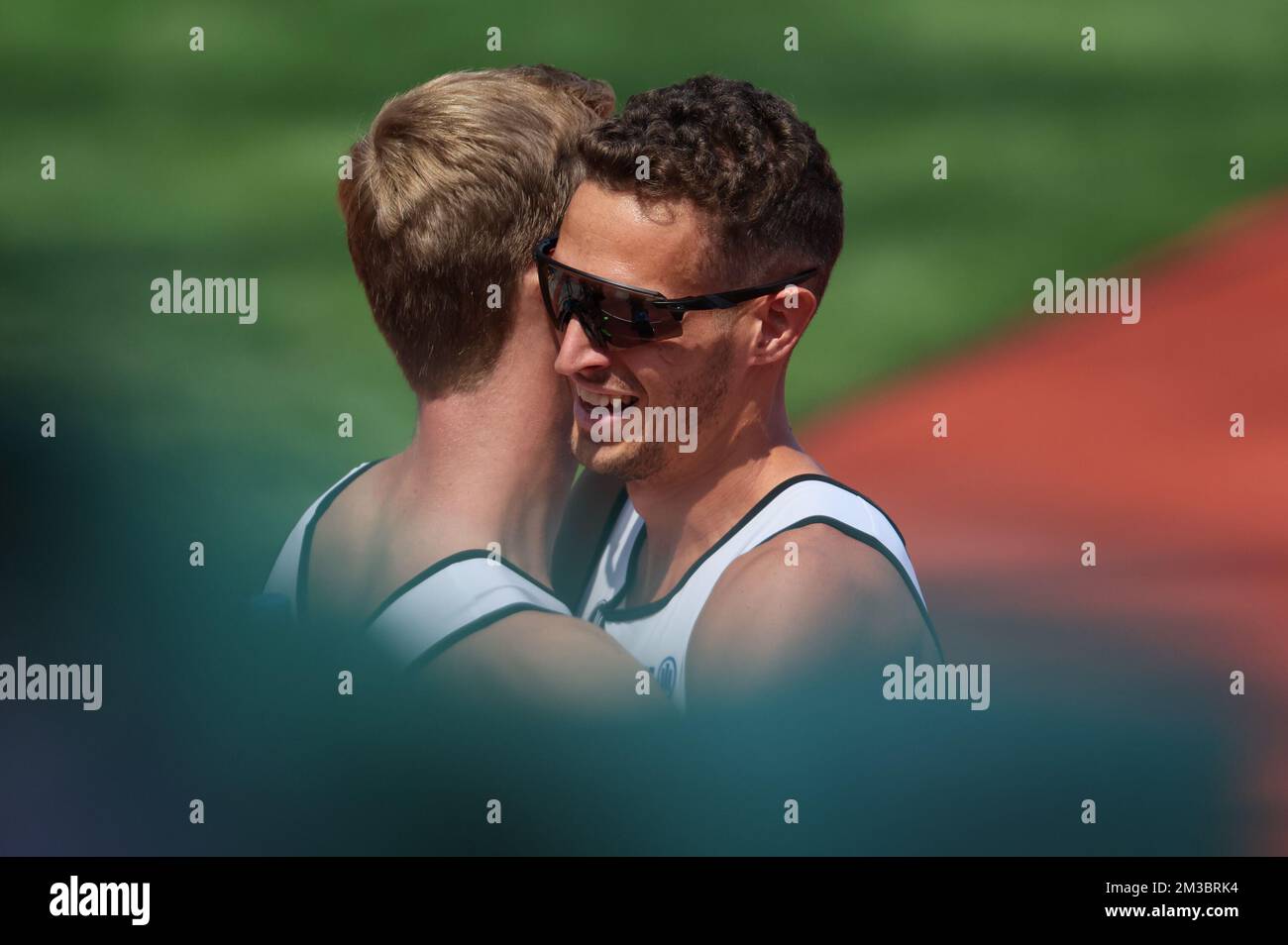 Belgian Alexander Doom congratulates Belgian Dylan Borlee who just ...