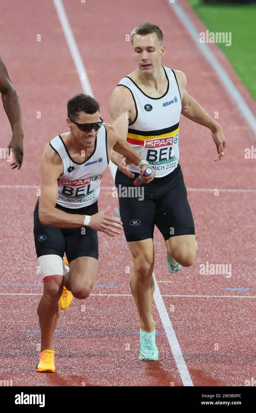 Belgian Julien Watrin hands out the relay to Belgian Kevin Borlee at ...
