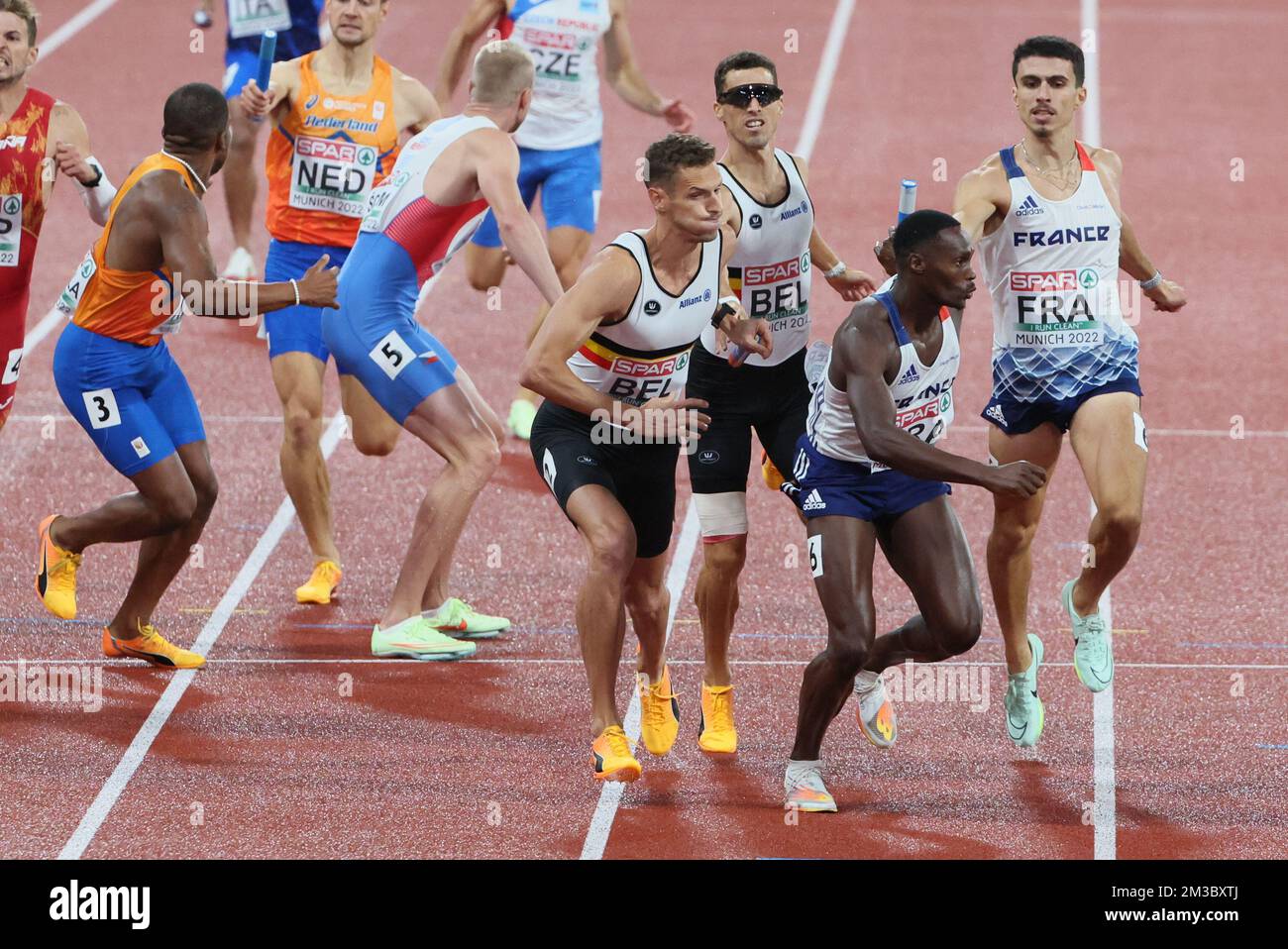 Belgian Kevin Borlee hands out the relay to Belgian Dylan Borlee at the ...