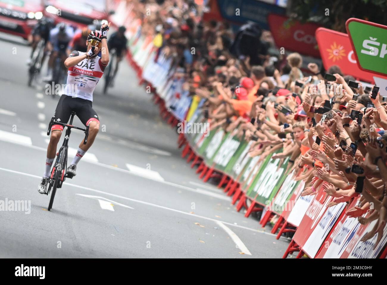 Spanish Marc Soler of UAE Team Emirates celebrates as he crosses the ...