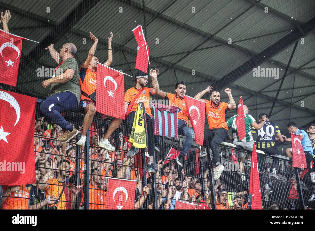 Basaksehir's supporters celebrate during a soccer game between Belgian ...