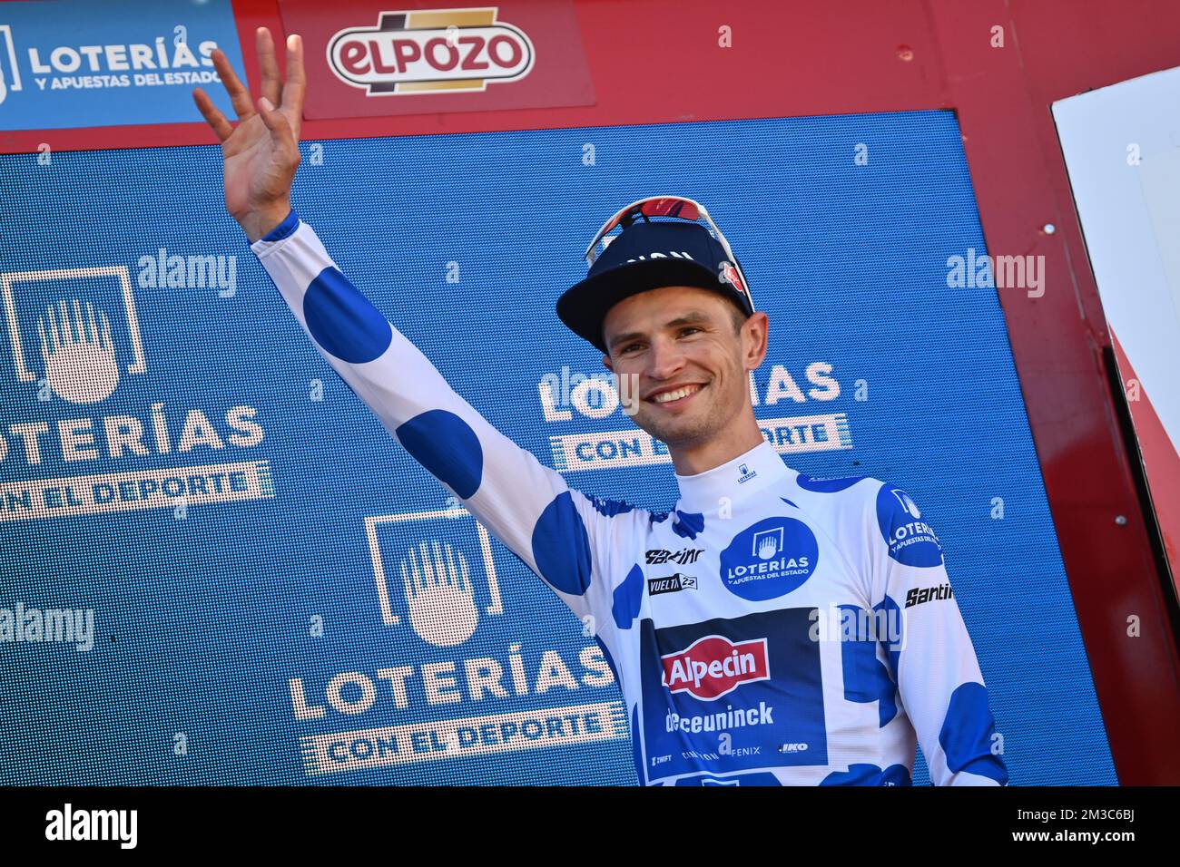 Australian Jay Vine of Alpecin-Deceuninck celebrates on the podium in ...