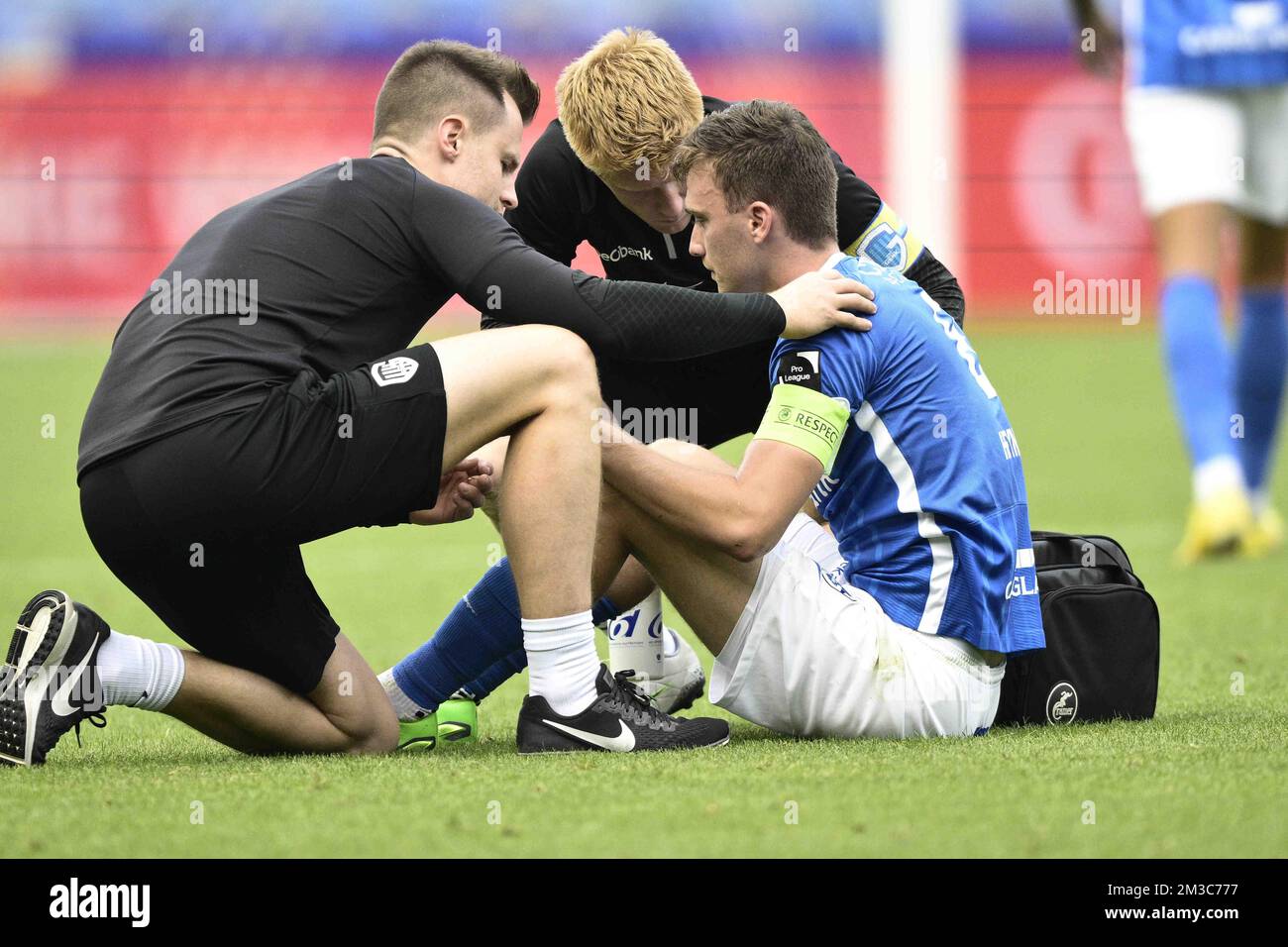 Genk's Bryan Heynen looks injured during a soccer match between KRC ...