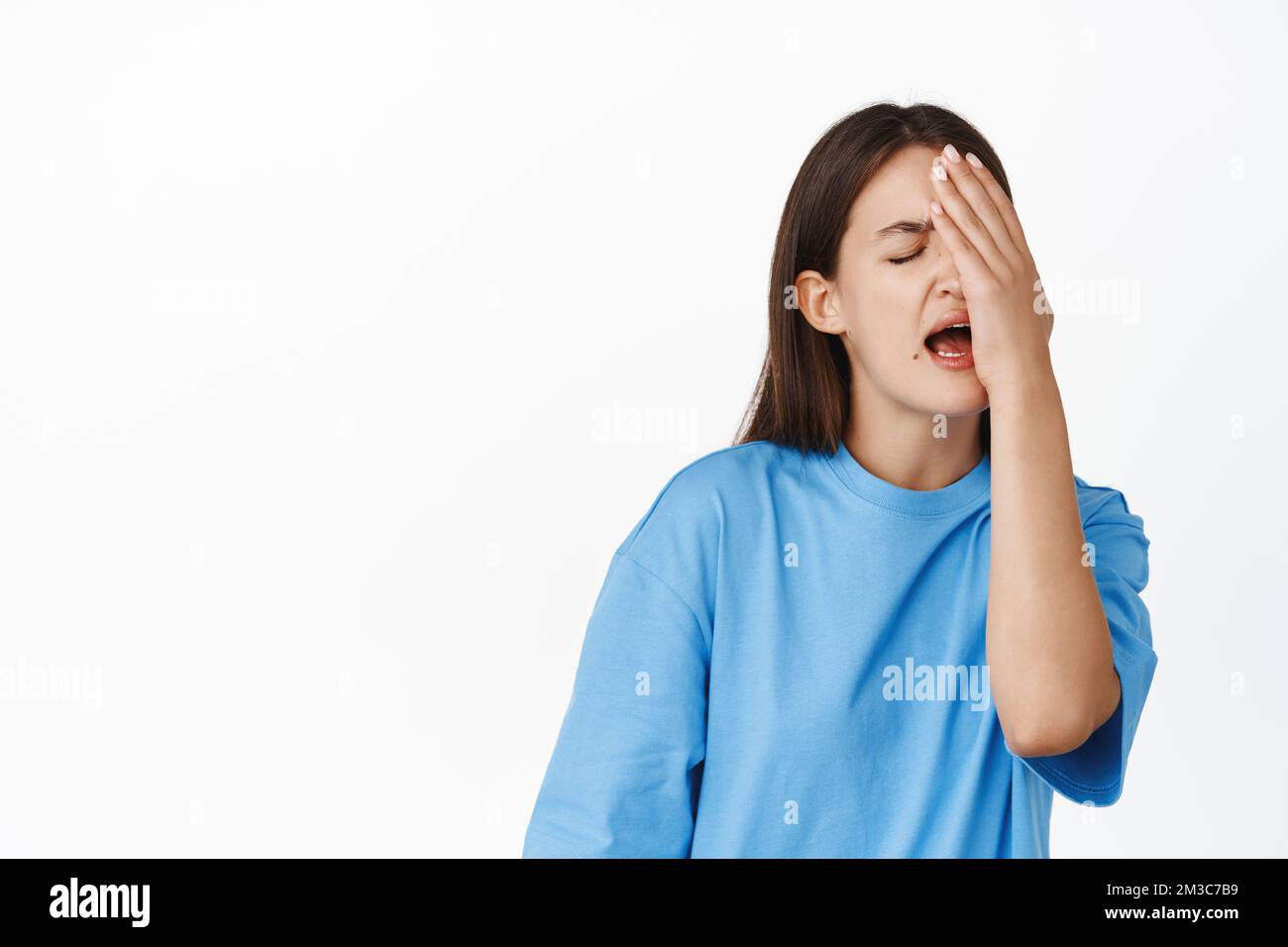 Image of devestated brunette girl slap face, facepalm frustrated ...