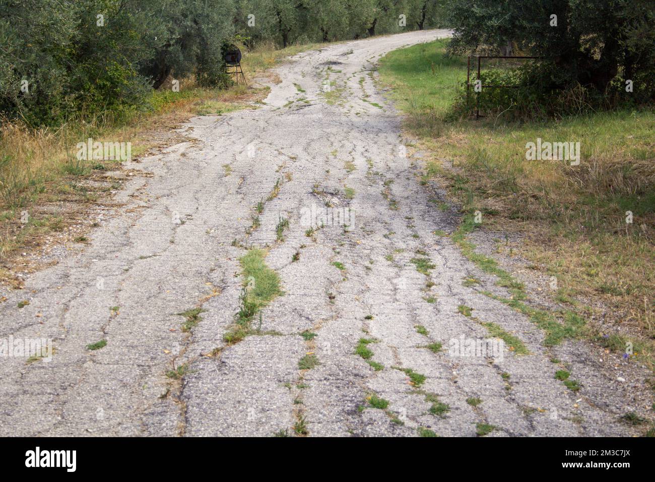 Image of a rough and completely broken and abandoned country road Stock ...