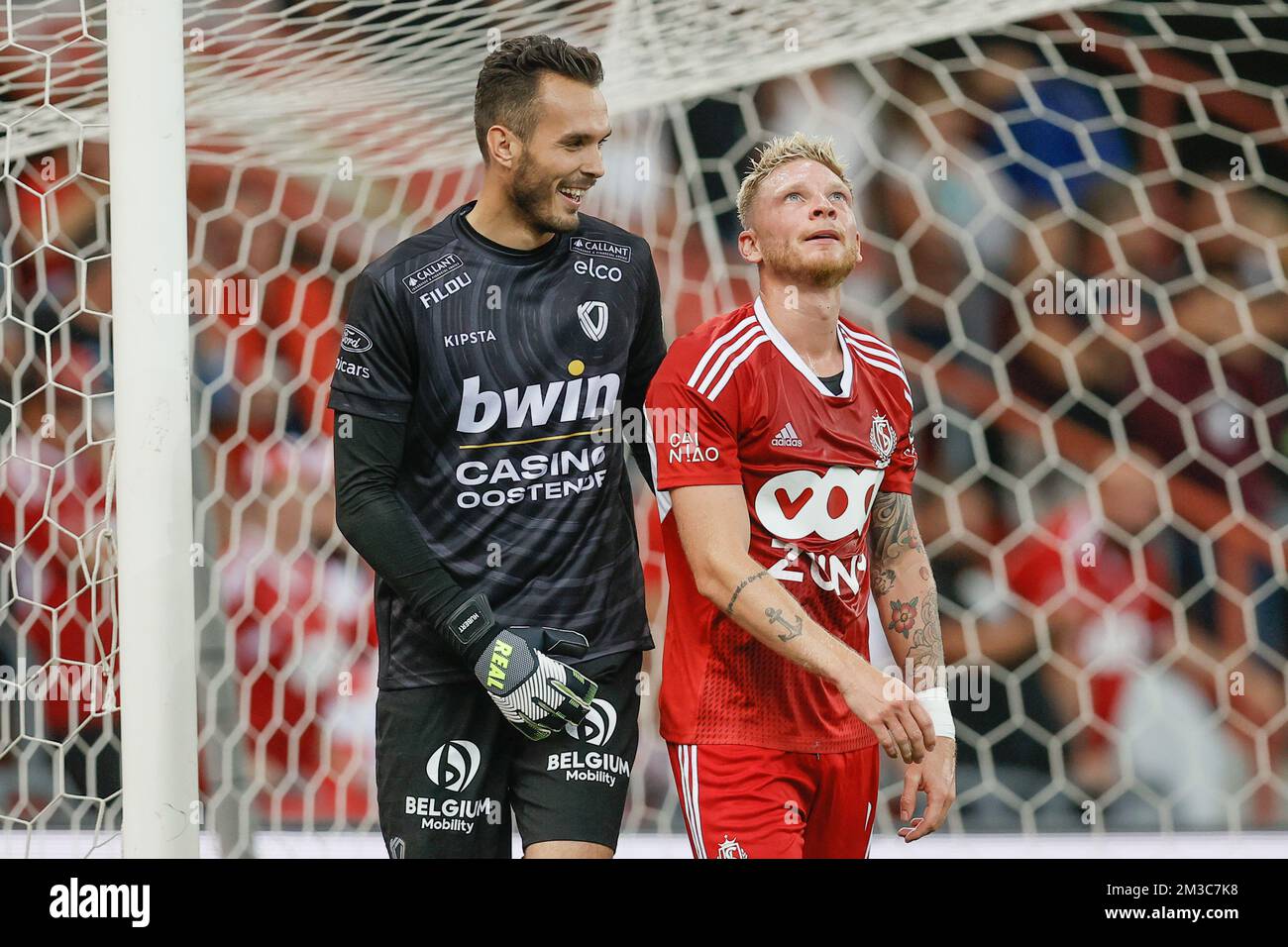 Oostende's goalkeeper Guillaume Hubert and Standard's Renaud Emond ...