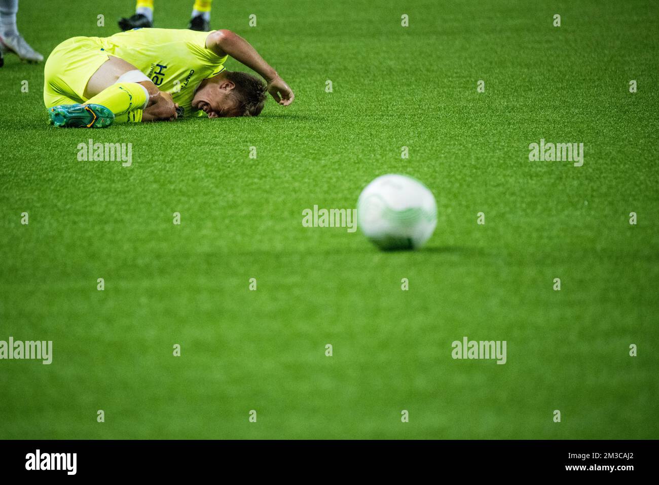 Gent's Matisse Samoise lies on the ground during the game between ...