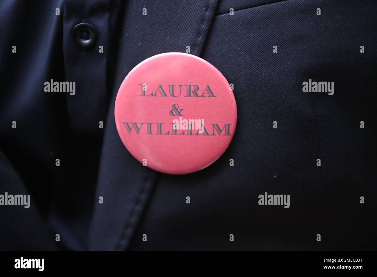 Illustration shows a badge with the names of the married couple at the ...