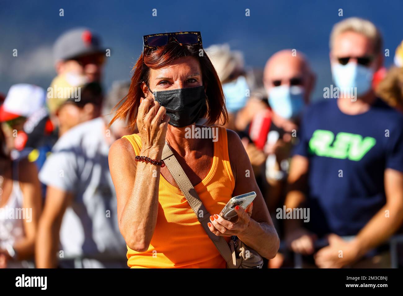 Remco Evenepoel's mother Agna Van Eeckhout watches the podium after ...