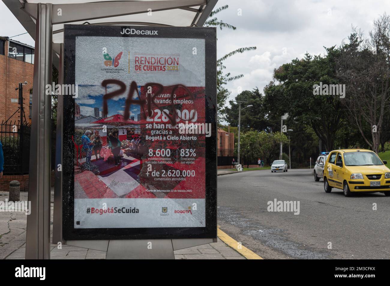 BOGOTA, COLOMBIA - MAY 20 OF 2021 A break glass and a protest graffiti ...