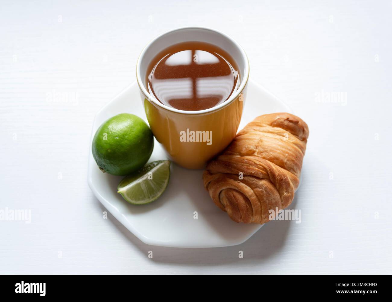 A top view of a yellow cup with Colombian traditional hot drink knowed ...