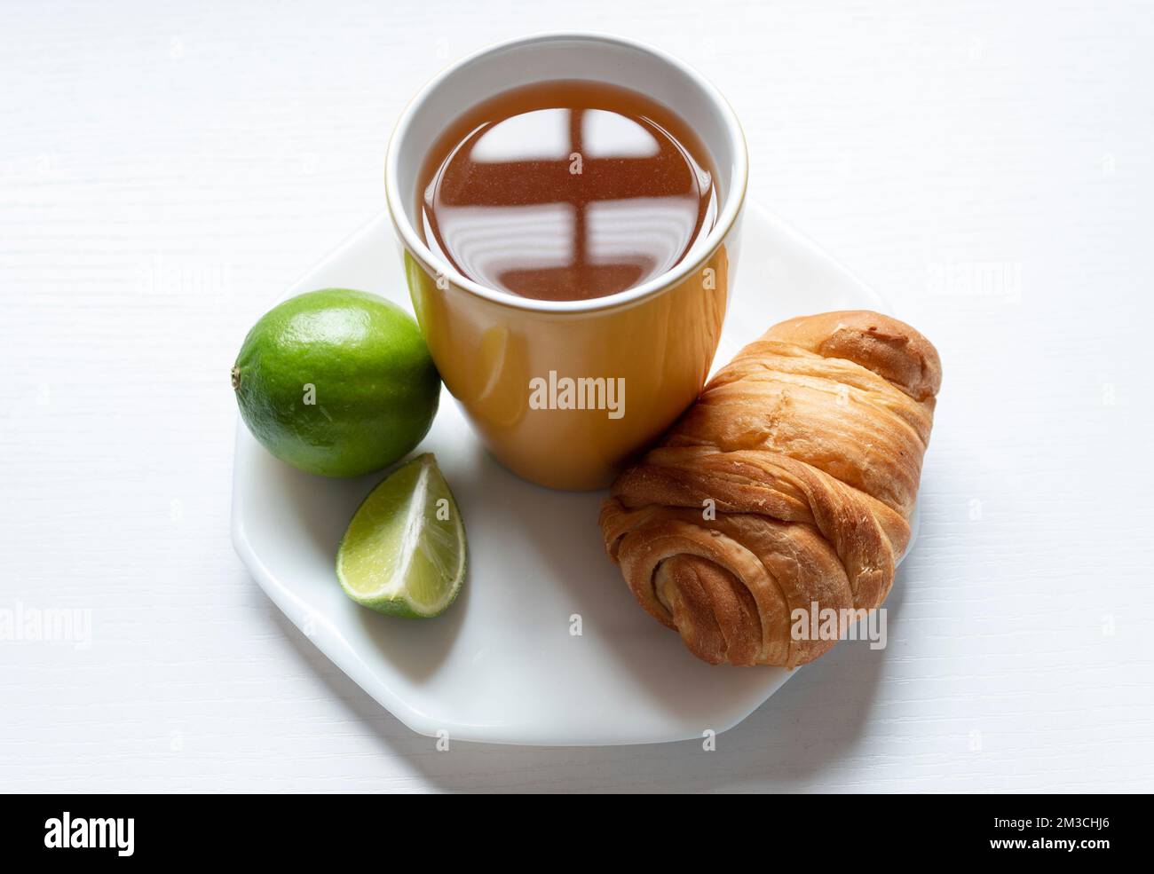 A top view of a yellow cup with Colombian traditional hot drink knowed ...