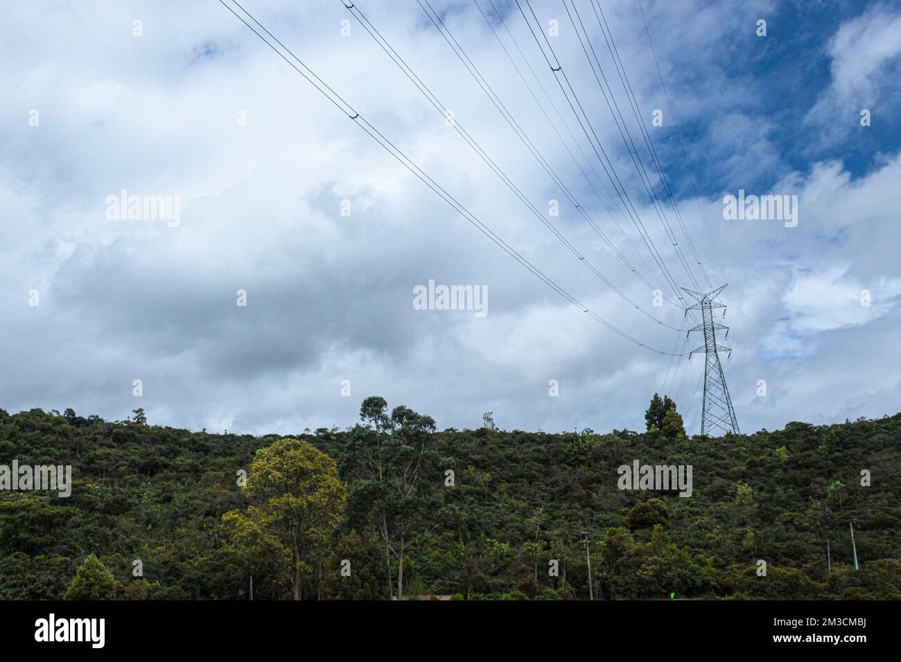 Vibrant capture of an energy tower with high voltage cables line at the ...