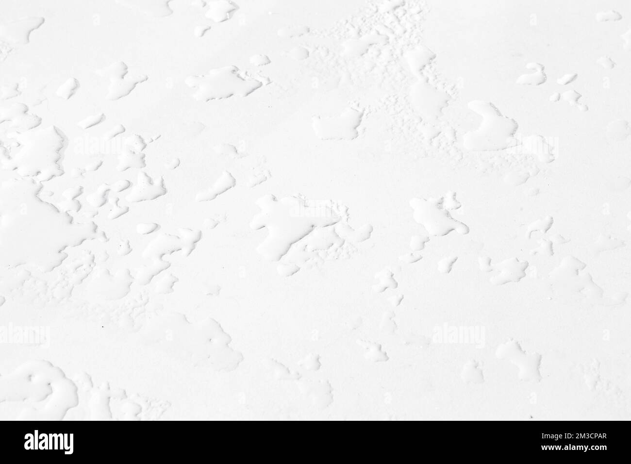 background of water drops at a white table in harmonic pattern Stock ...