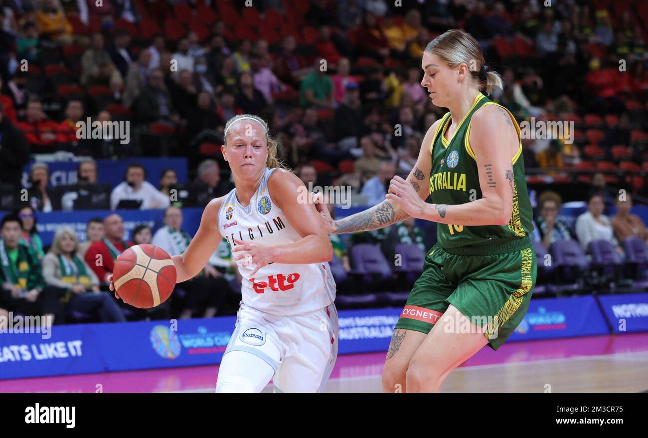 Belgium's Julie Allemand and Australian Cayla George fight for the ball ...