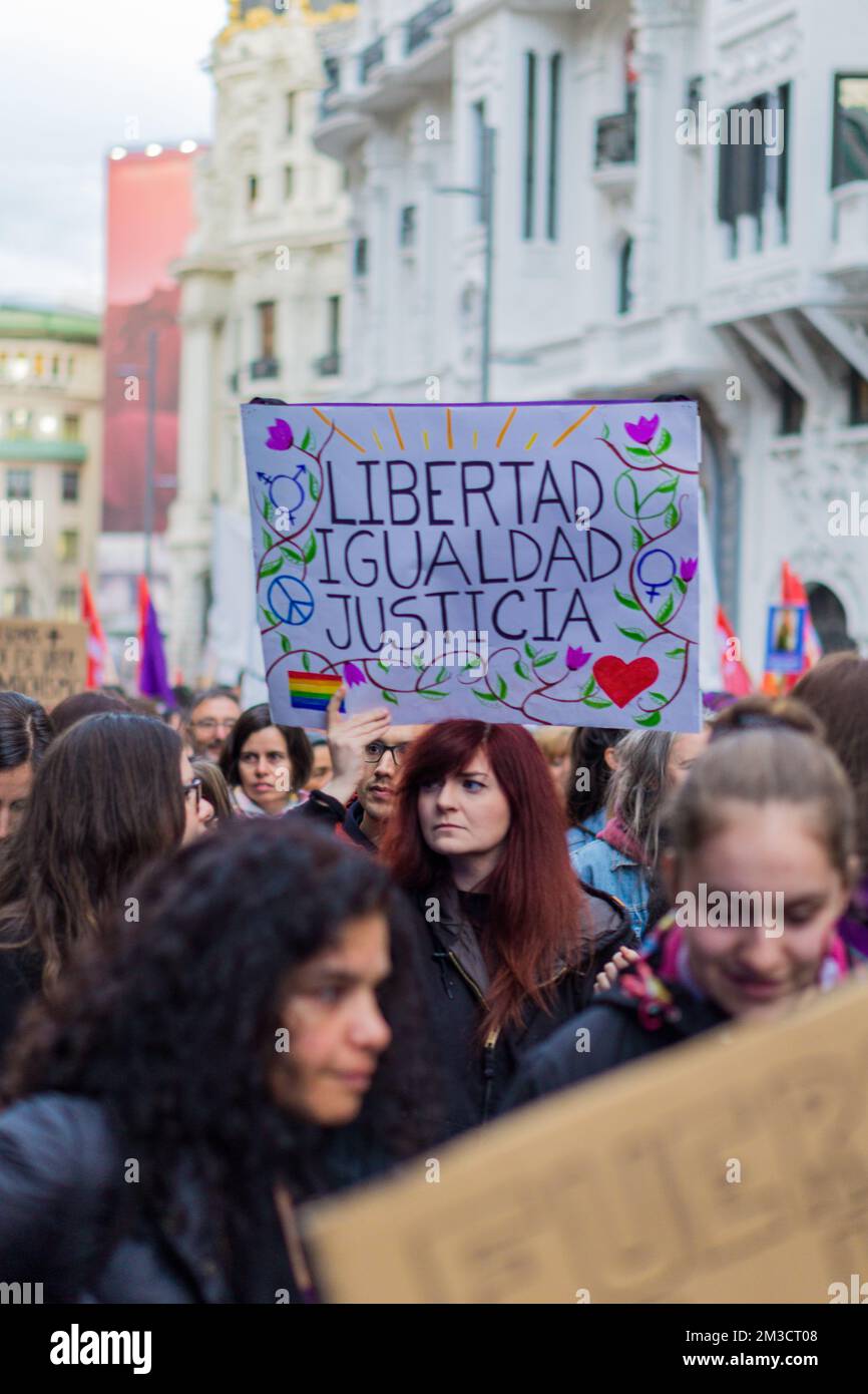 A young red hair woman with protest sign during M8 International Women ...