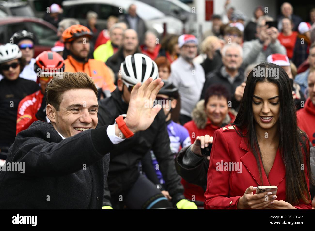 Remco Evenepoel and his partner Oumaima Oumi Rayane sit in a ...